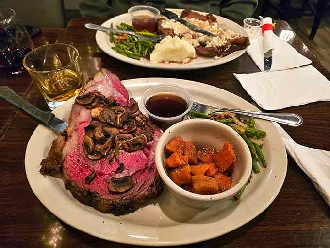 Prime rib perfection that would make a vegetarian weep with temptation. That rosy center and mushroom topping are what food dreams&mdash;and slight meat sweats&mdash;are made of.