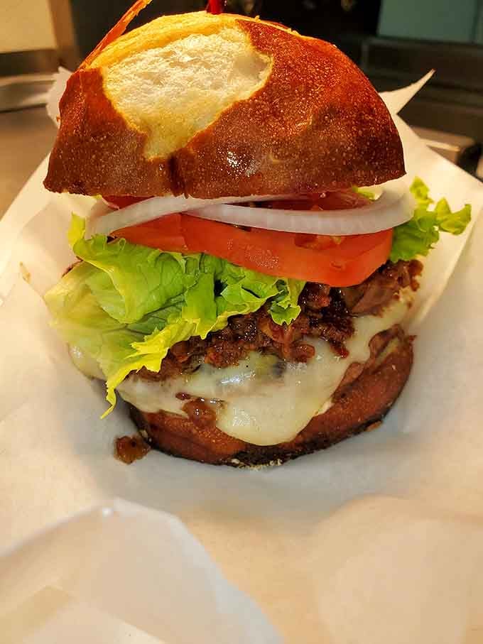 That pretzel bun burger situation looks like it could solve most of life's problems in delicious, melty fashion.