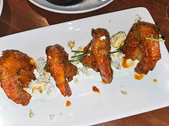 Golden, crispy, and glistening with Buffalo sauce, these shrimp are about to make your taste buds very happy.