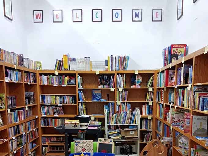 The children's section greets young readers with colorful displays that make building a home library actually affordable.