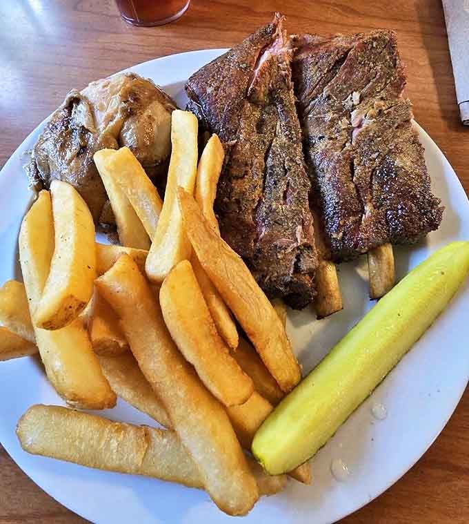 Ribs that don't just fall off the bone&mdash;they practically leap into your mouth. Paired with golden fries and a pickle, it's the holy trinity of comfort food.