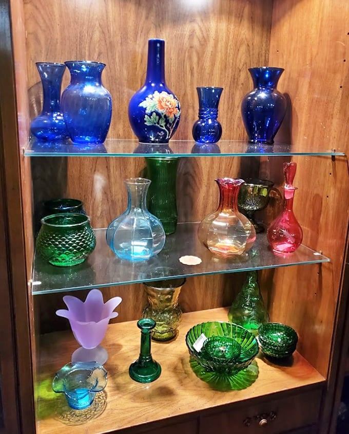Cobalt blue vases and emerald green bowls shimmer like jewels from your grandmother's secret stash.