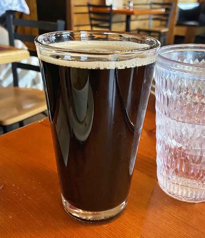 The legendary root beer arrives like liquid velvet in a glass&mdash;dark, mysterious, and commanding more respect than most fine wines ever will.