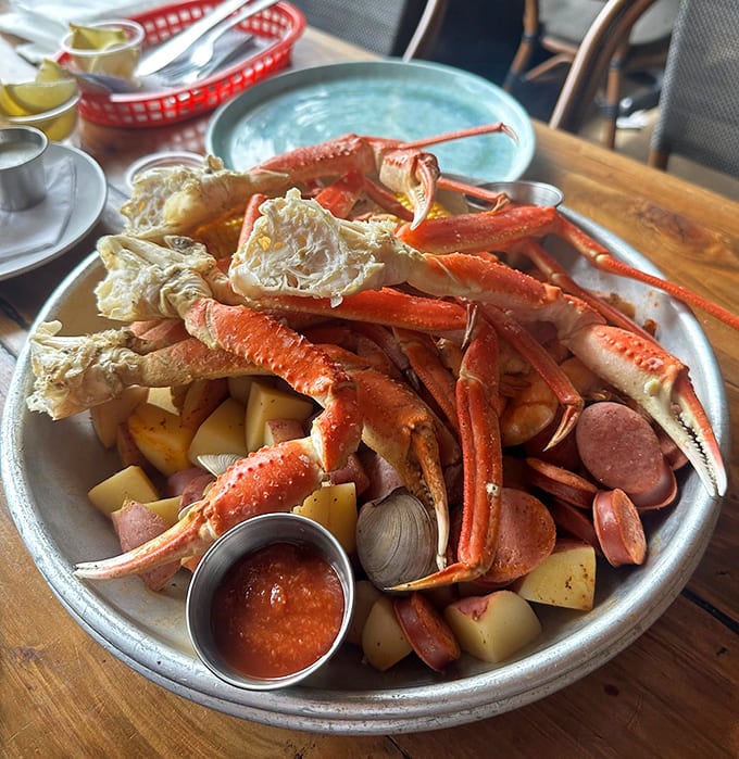 Behold the glorious chaos of a proper crab boil, complete with potatoes, sausage, and clams galore.