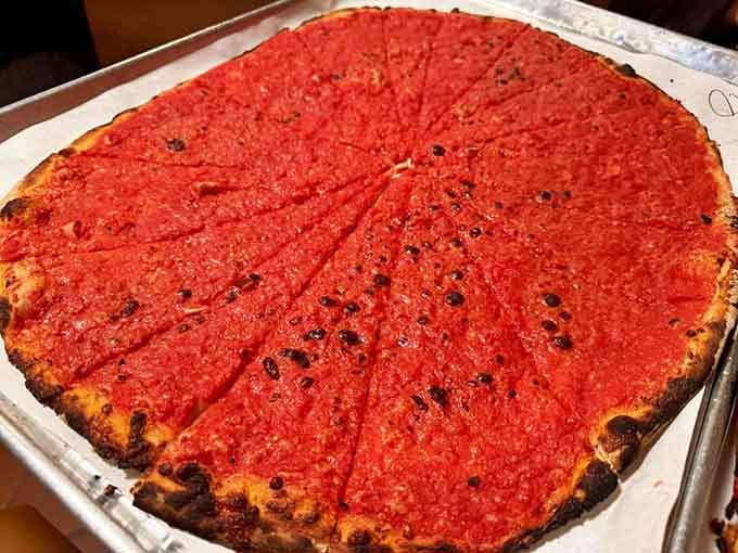 Behold the tomato pie in all its cheese-less glory, charred to perfection and ready to convert the skeptics.