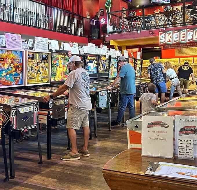 Three generations, one arcade, zero arguments about what to do, because pinball speaks a universal language of fun.