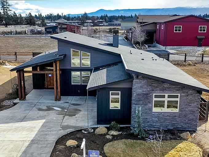 Modern mountain living meets small-town charm in architecture that respects both comfort and character.