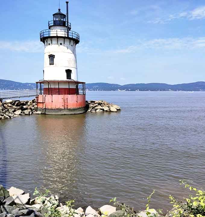 The Sleepy Hollow Lighthouse stands guard over the Hudson, a nautical sentinel with serious waterfront real estate.