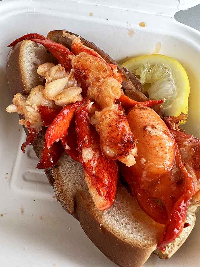 Behold the lobster roll that launched a thousand return trips &ndash; generous, gorgeous, and gloriously messy in all the right ways.
