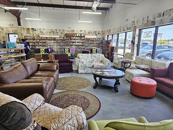Mismatched couches and vintage speakers create a living room vibe that says "stay awhile, nobody's rushing you."