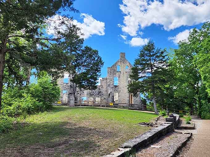 Stone walls standing proud against blue sky, proving that even ruins can have better posture than most of us.