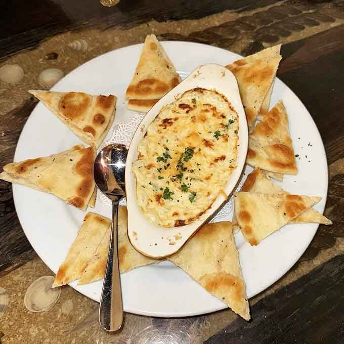 That golden, bubbling crab dip surrounded by crispy pita points is basically a warm hug in appetizer form.