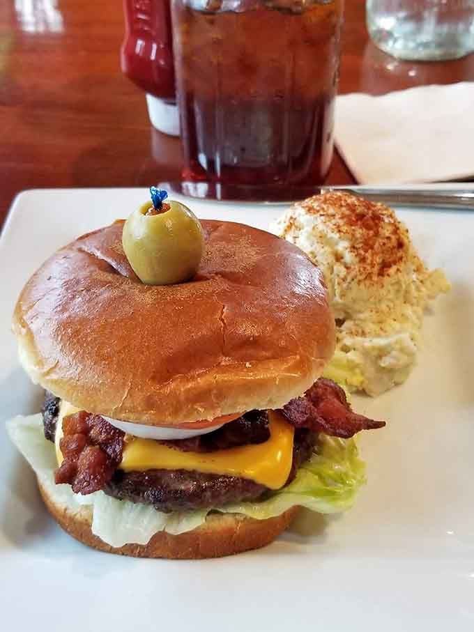 This burger comes with bacon, cheese, and a name that'll have you giggling like a teenager at the dinner table.