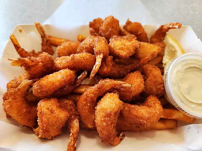 Golden, crispy perfection with tails still on&mdash;these beauties prove why this place earned its name and reputation.