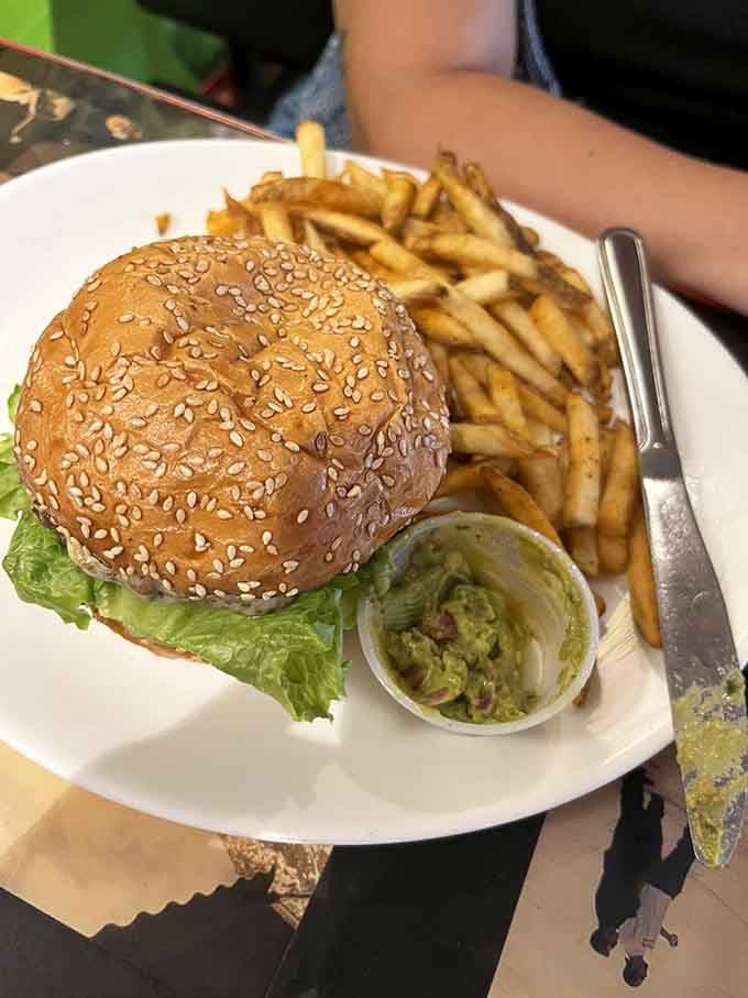 That sesame seed bun and perfectly stacked burger with guacamole is what burger dreams are made of, friends.