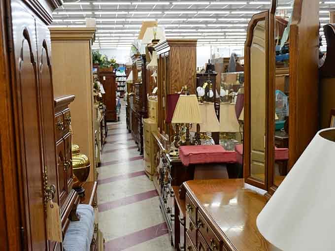 Furniture alley where vintage dressers and mirrors stand like sentinels, guarding the secrets of decades past.