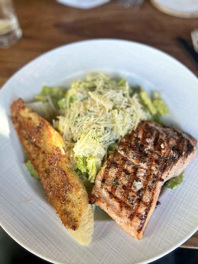 Perfectly grilled salmon with Caesar salad proves that sometimes the classics become classics for very good reasons indeed.