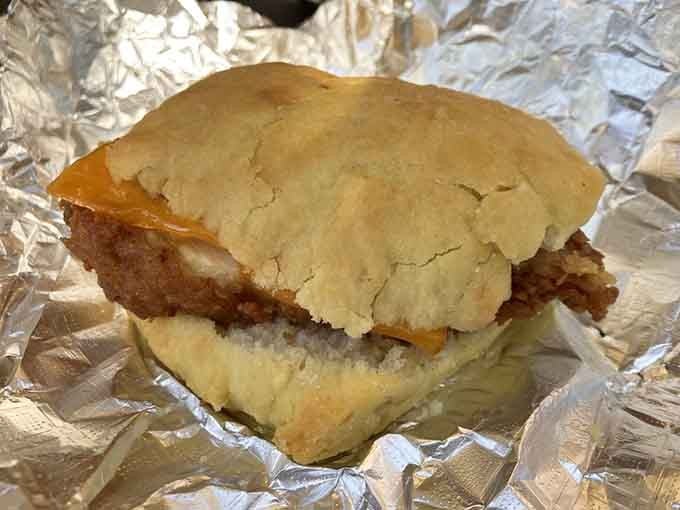 Behold the legend itself: golden fried chicken nestled in a buttery biscuit that could make grown adults weep with joy.