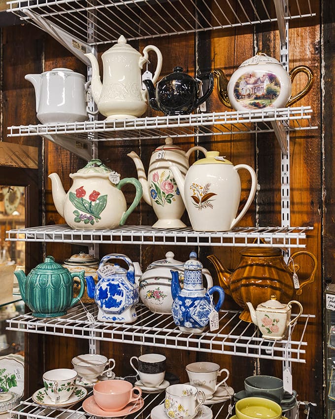 Tea time capsules! These vintage pots tell stories of countless afternoon conversations, each chip and pattern a chapter in America's social history.