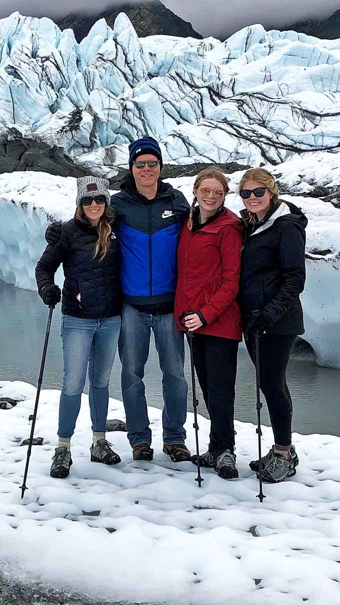 Adventure-seekers equipped with hiking poles and proper gear experience the glacier up close. That's not your average snow cone underfoot!