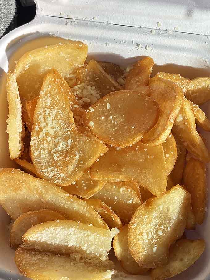 Golden, crispy potato ribbons dusted with parmesan prove that sometimes the simplest things in life are absolutely the best things.