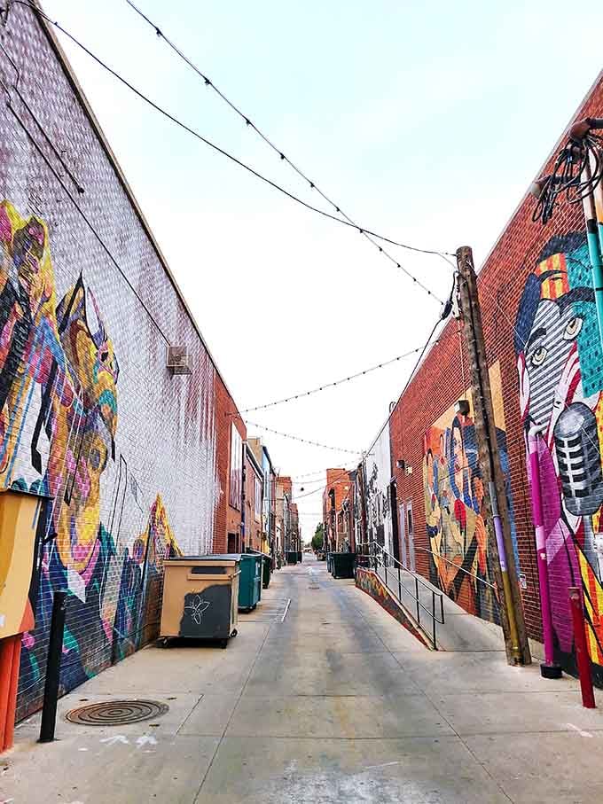 Greeley's alleyway murals transform utilitarian spaces into open-air galleries, proving beauty can thrive anywhere—even next to dumpsters.
