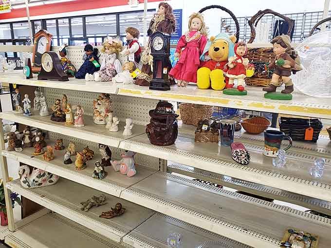 Porcelain figurines and vintage dolls stand at attention, silently telling stories of past lives and previous homes. Winnie the Pooh seems particularly pleased with his new surroundings.