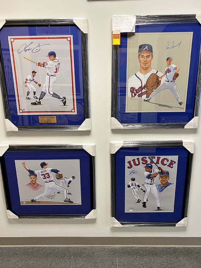 Atlanta Braves legends immortalized on the wall. Baseball memorabilia that captures America's pastime better than a seventh-inning stretch.