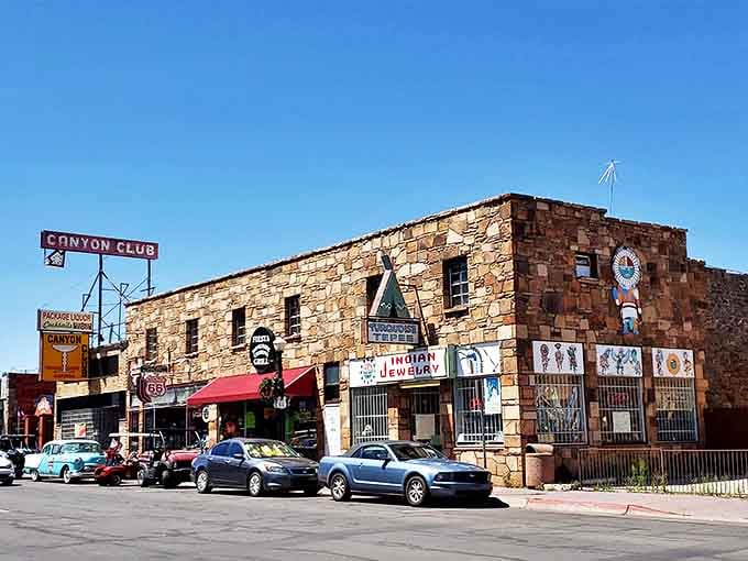 The Canyon Club's stone exterior houses treasures of the Southwest. Route 66 signage promises the authentic experience road-trippers crave.