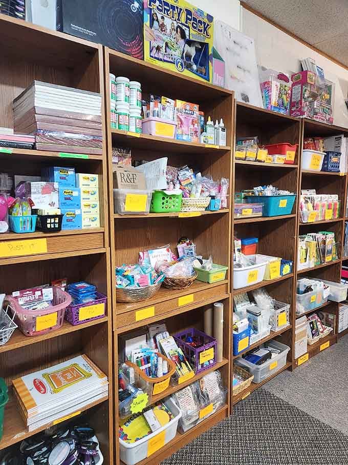 Organization amid abundance! Wooden shelves and blue baskets create a system to the beautiful madness that makes treasure hunting possible.