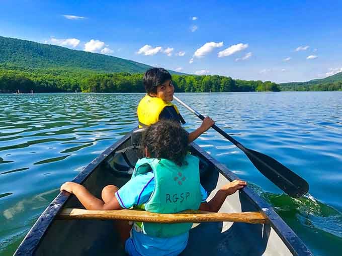 Young adventurers paddle across Lake Habeeb's pristine waters. Creating childhood memories that will outlast any video game achievement.