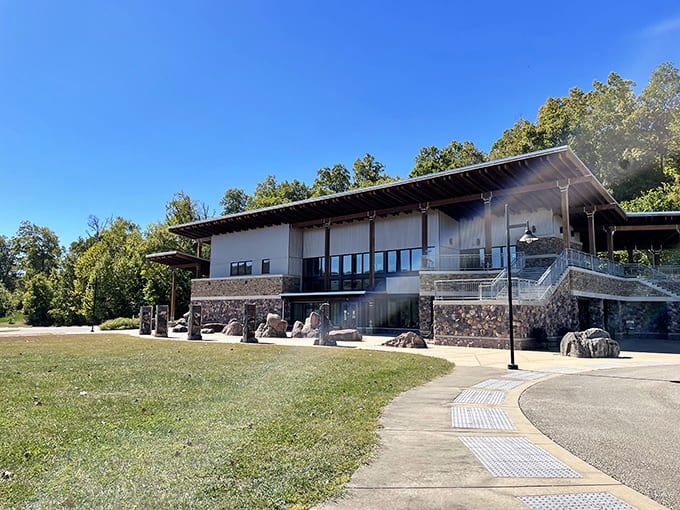 The visitor center stands as a testament to resilience, rebuilt after the 2005 reservoir breach with architecture that complements rather than competes with its surroundings.