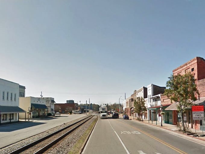 Railroad tracks running through downtown add character that modern cities traded away for parking garages and progress.