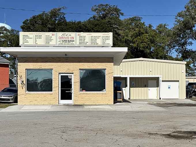 That classic drive-in menu board stretches across the roofline like a delicious promise written in the sky.