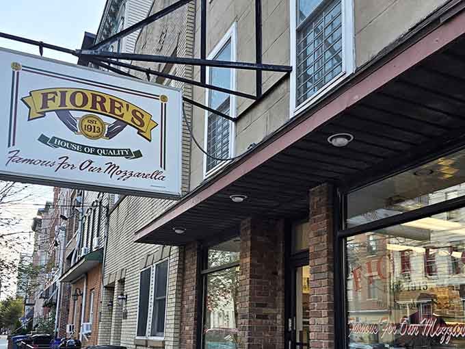 Fiore's vintage sign hangs proudly, announcing their mozzarella fame to a Hoboken street that's seen generations come for sandwiches.