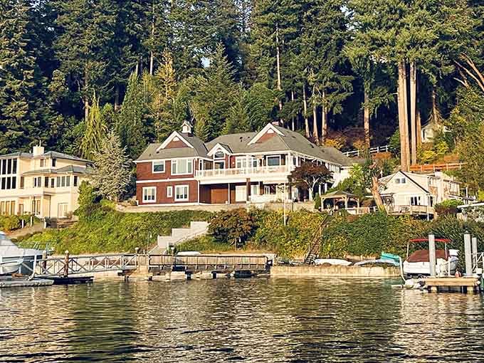 Elegant homes nestle into the forested hillside above private docks where boats wait patiently for weekend adventures.