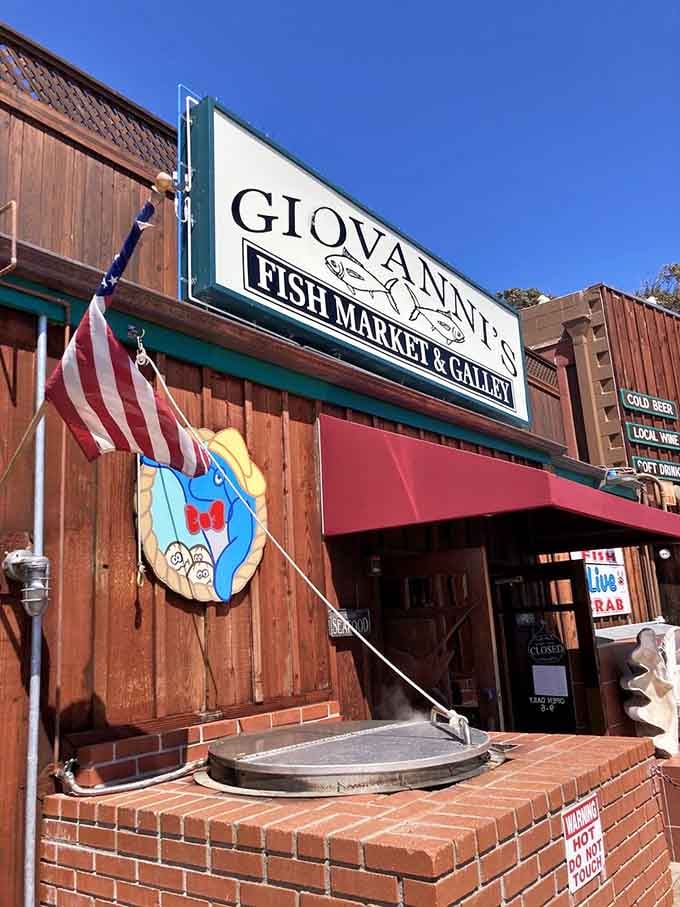 Giovanni's wooden charm could tell tales of a thousand catches. That sign promises fish market freshness with old-school coastal character.