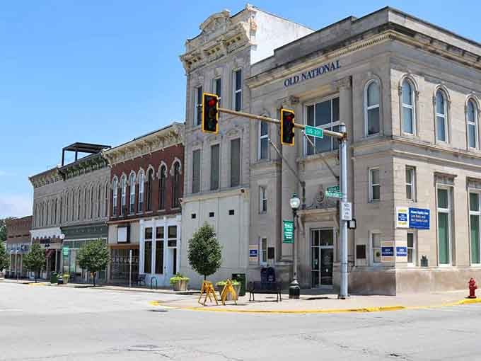 Corner buildings wear their age like badges of honor, each brick telling stories of practical Midwestern values.