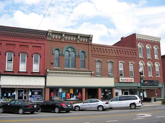 Decorative brickwork and arched windows show craftsmanship that modern buildings just don't bother with anymore, honestly.