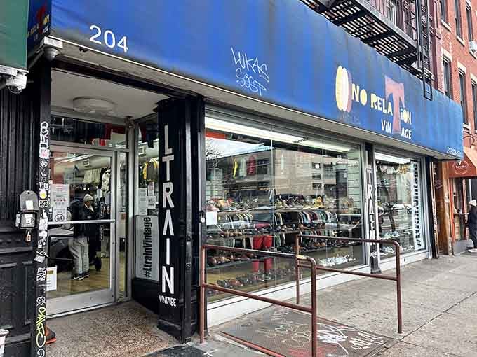 That bold blue storefront promises vintage treasures inside, where every rack tells a different decade's fashion story.