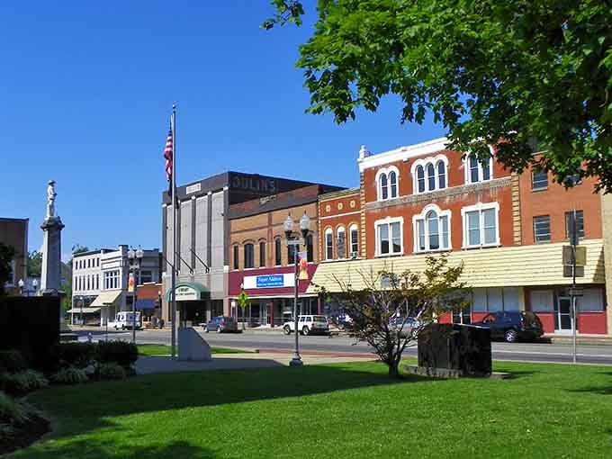 Downtown Madisonville's historic charm shines under blue Kentucky skies, where brick buildings tell stories of yesterday while housing today's local treasures.