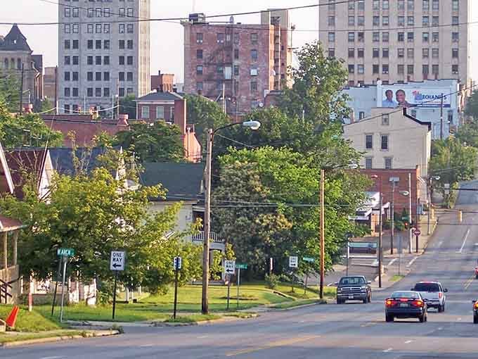 Wide boulevards and mature trees frame a cityscape where your retirement dollars actually mean something worthwhile here.