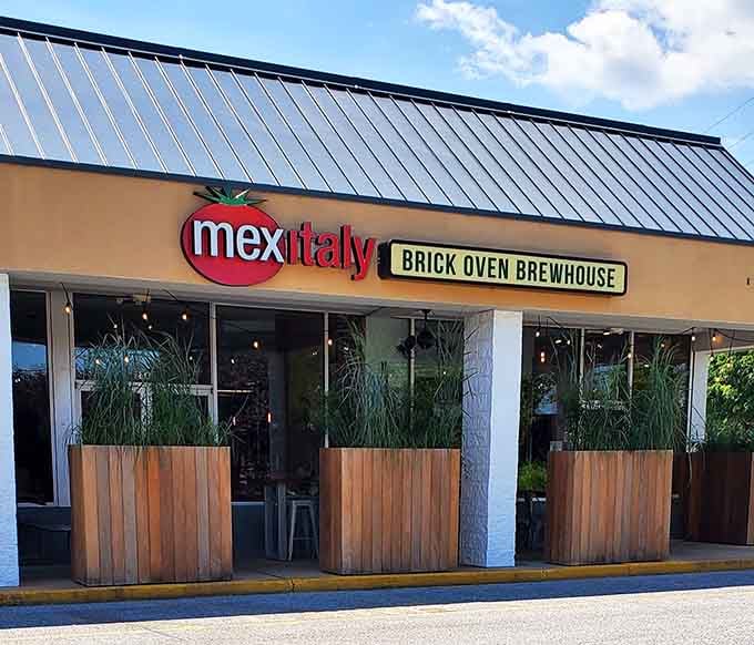 When Mexico and Italy had a delicious baby, it grew up to serve brick-oven masterpieces behind these wooden planters.