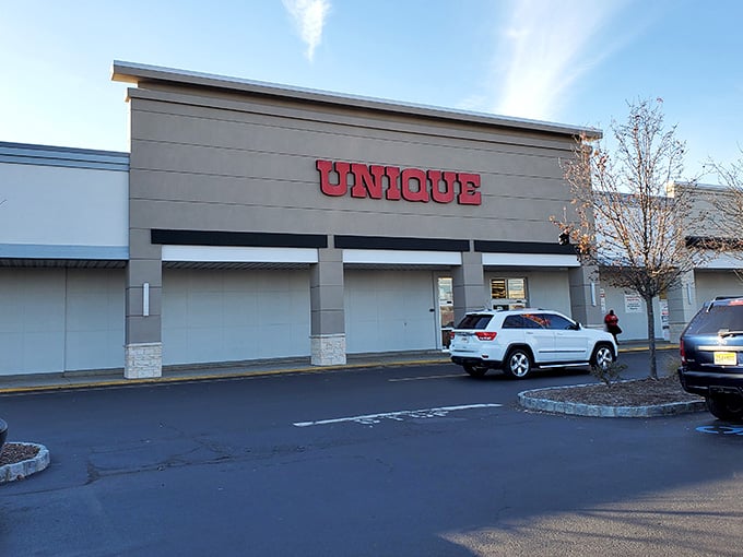 Bold red letters announce "UNIQUE" like a Broadway marquee, and the store delivers on that theatrical promise inside.
