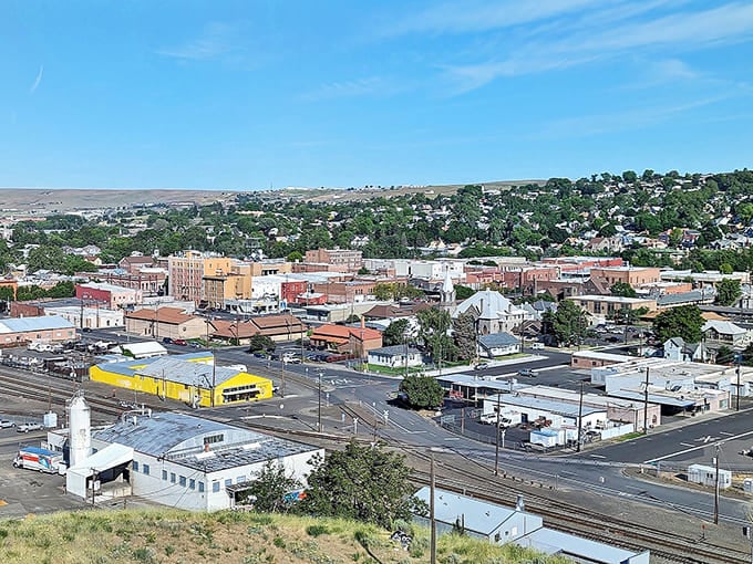 From above, this river town reveals its compact beauty nestled between rolling hills and endless sky.