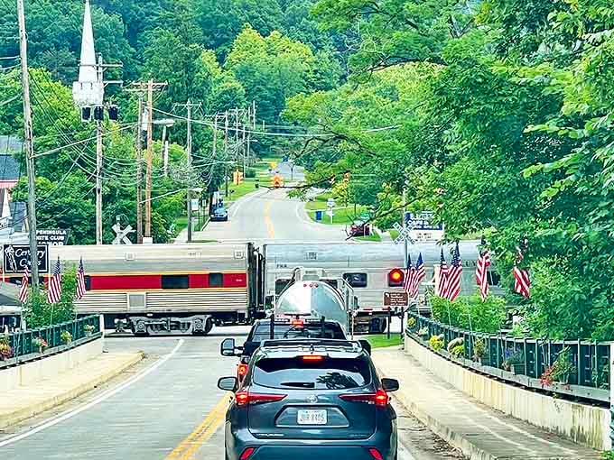 All aboard for small-town charm! A train crossing through Peninsula creates that perfect "wait for it" moment every visitor hopes to capture.