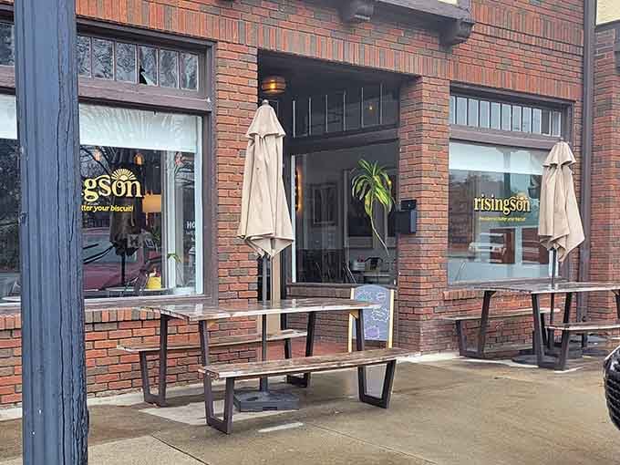 Rising Son's brick facade and outdoor seating create the perfect backdrop for morning conversations and coffee contemplation.