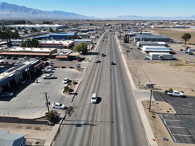 Wide-open roads stretching toward mountain ranges, the kind of view that makes you understand why people love small towns.