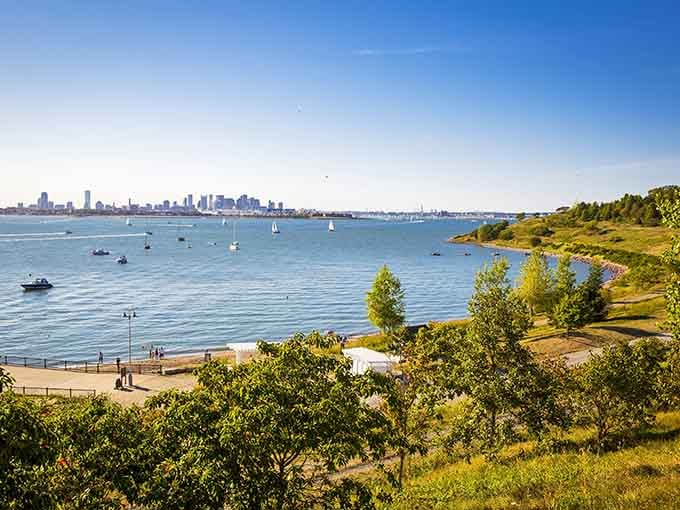 Boston&rsquo;s skyline gleams across the water, offering a perfect view of the city from this serene island.