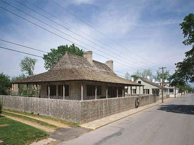 French colonial architecture with a sweeping roofline that's sheltered generations of stories, meals, and memories worth preserving.